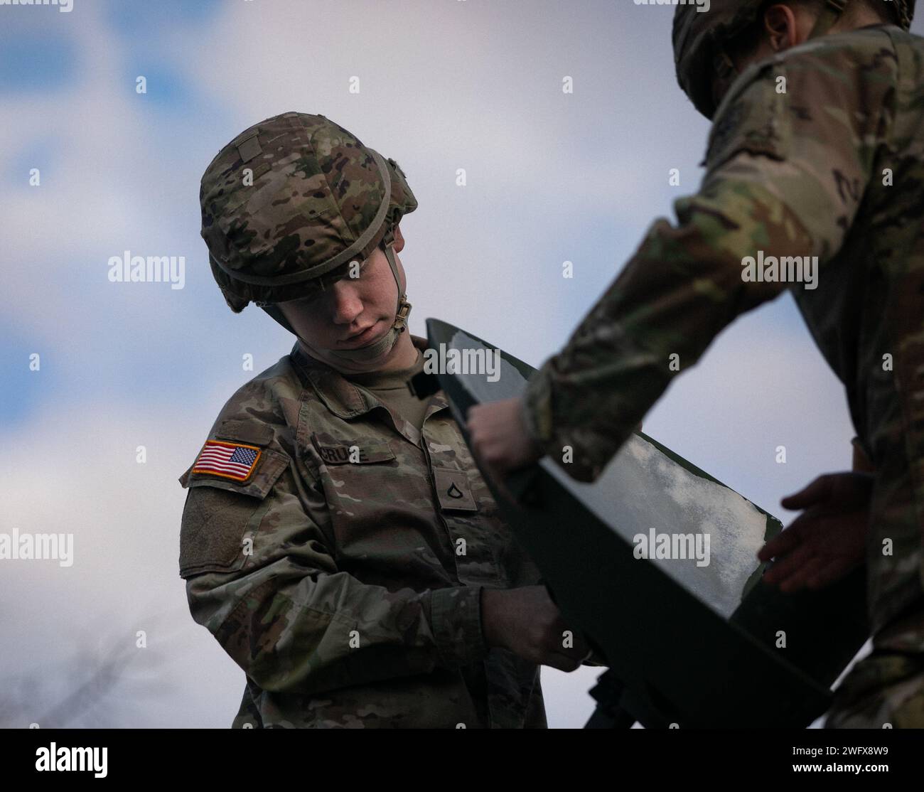 Pfc. Ethan Cruce assembles a satellite in the area of operations for ...