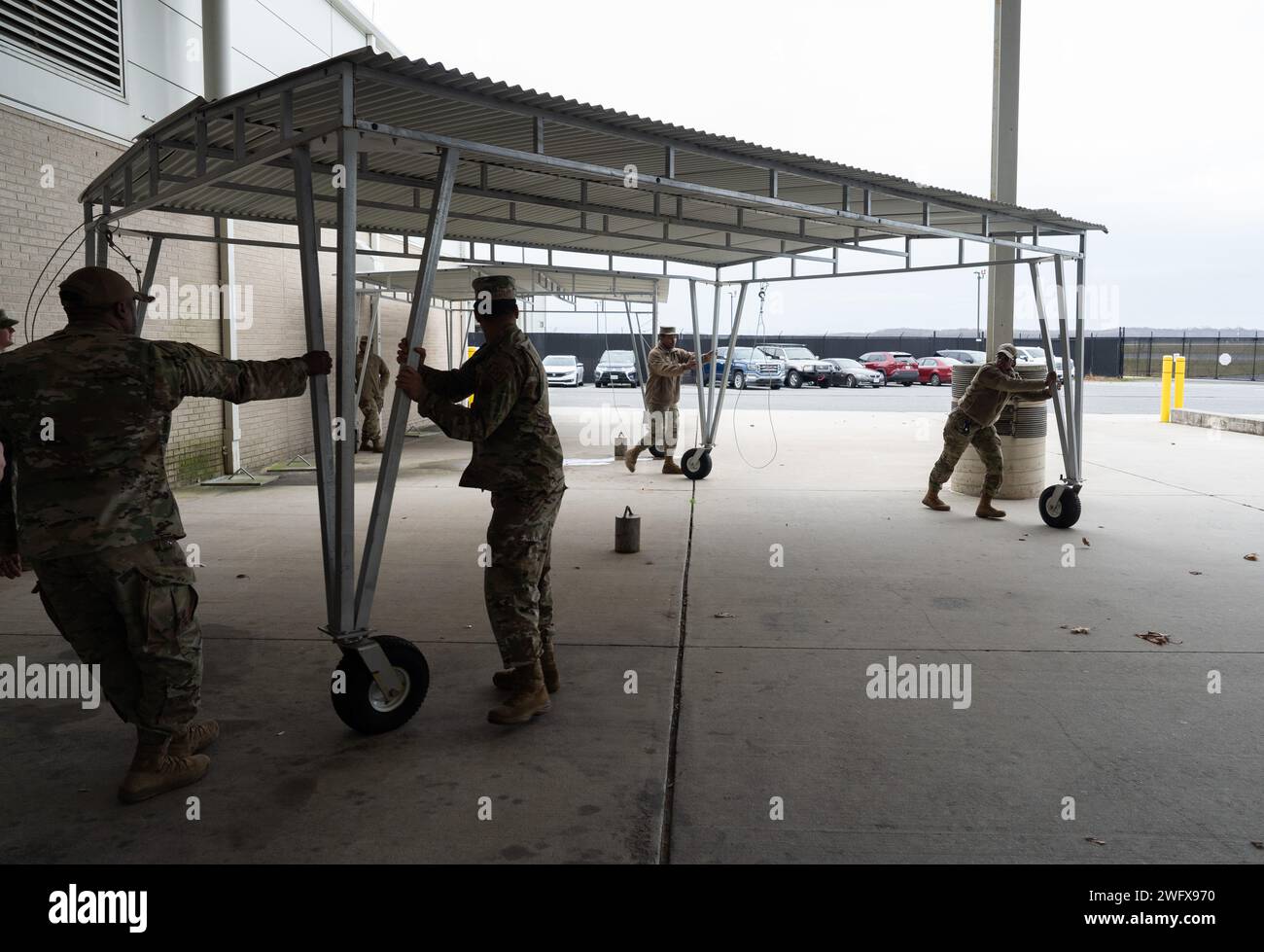 Airmen deployed to Air Force Mortuary Affairs Operations prepare for an ...