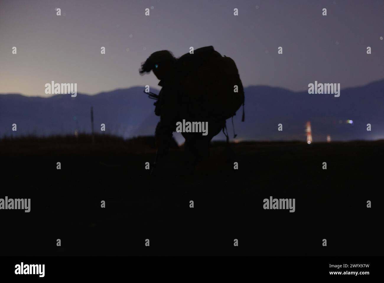 A U.S. Marine prepares for a patrol during Reconnaissance Certification ...