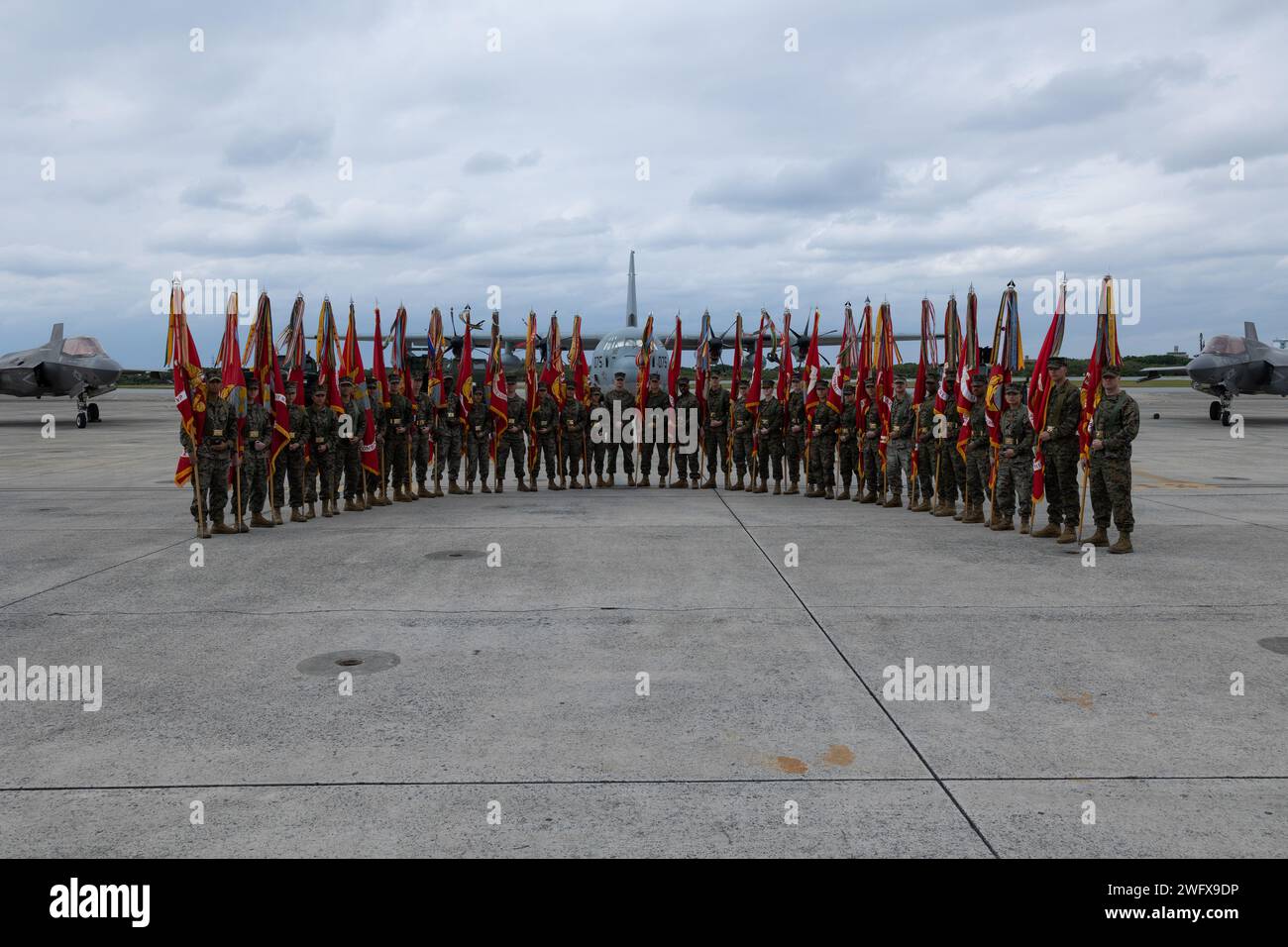 U.S. Marines with III Marine Expeditionary Force color guard teams pose ...
