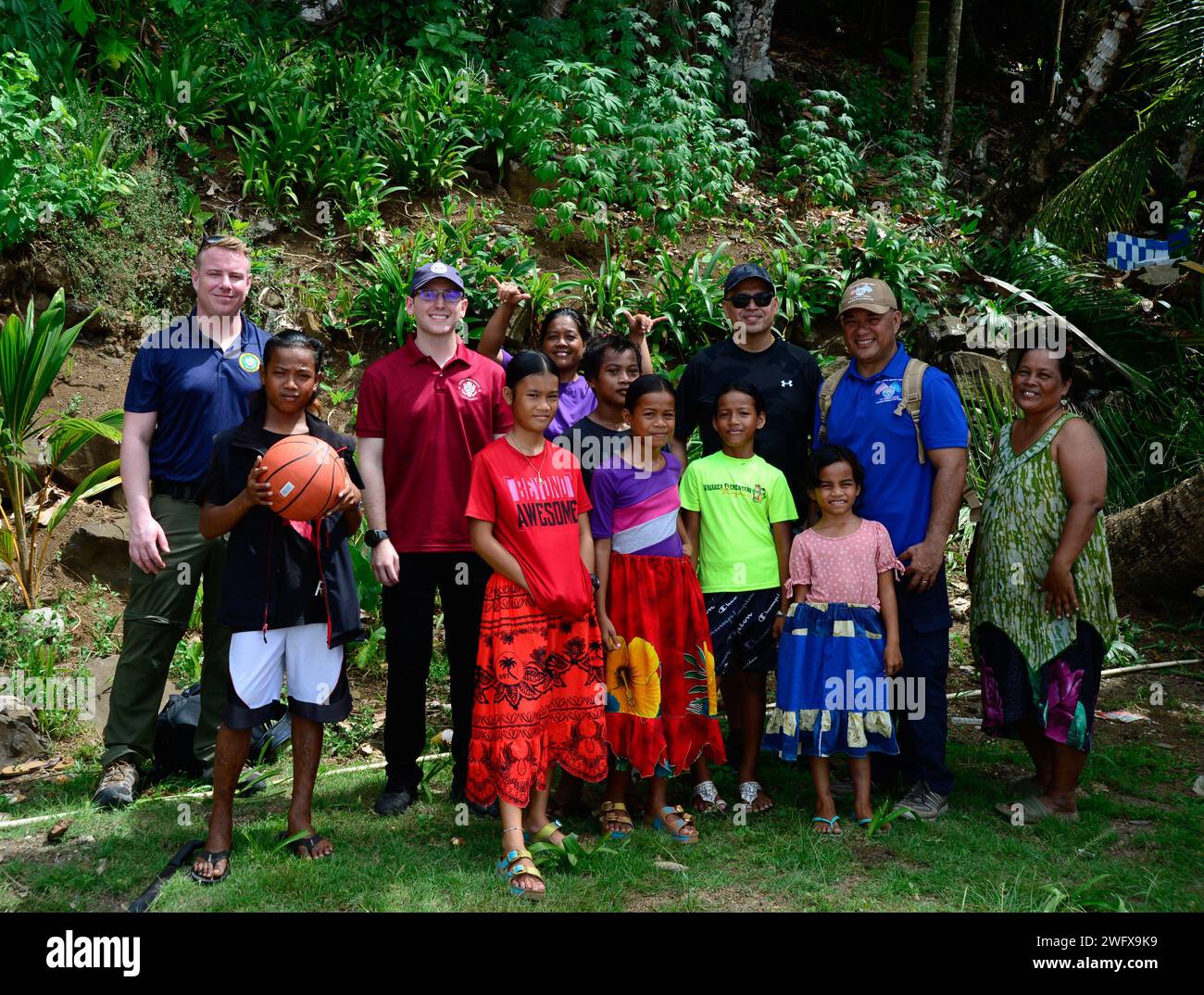 U.S. Army Civil Affairs members pose for a group photo with Chuukese ...