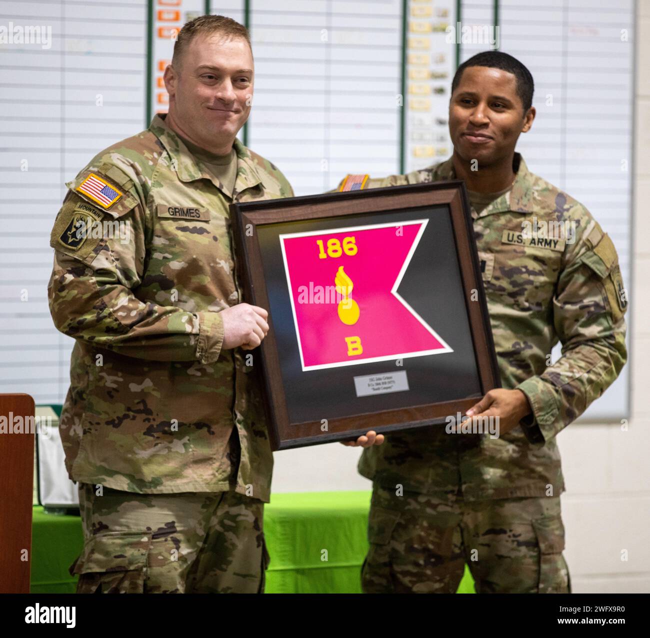 U.S. Army Soldiers 1st Sgt. John Grimes (outgoing) and Capt. Jason ...