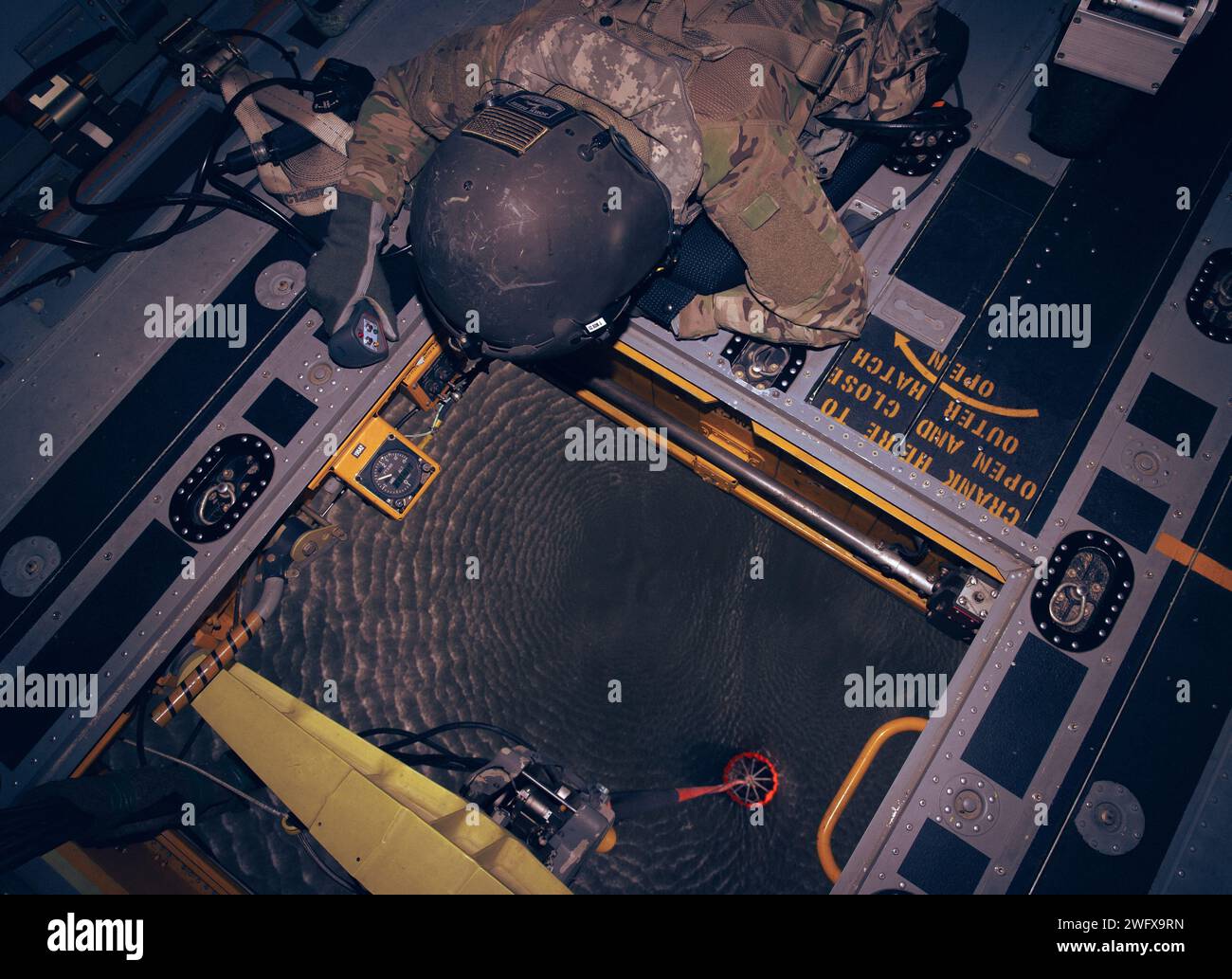 U.S. Army Cpl. Hank Watkins, a CH-47 Chinook crew chief with the 1 ...