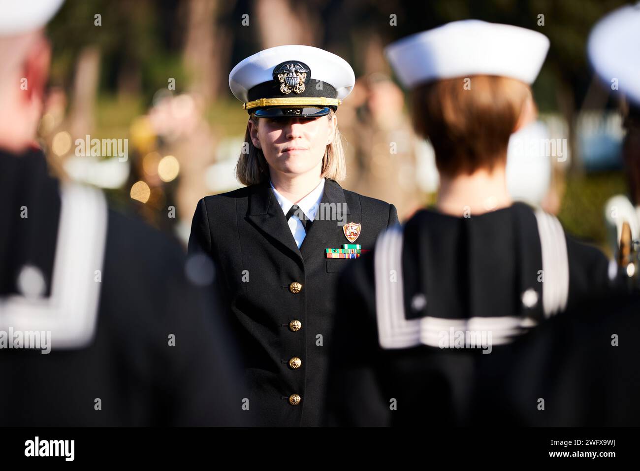 U.S. Navy Ensign Adele Demi, a ceremonial band conductor with the U.S ...