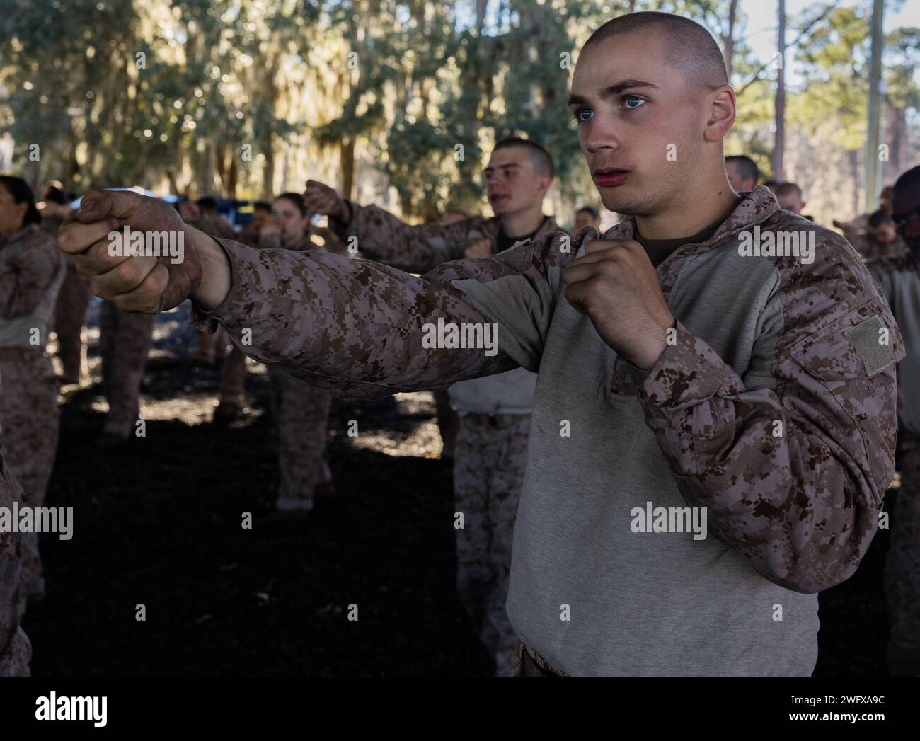 Recruits with Kilo Company, 3rd Recruit Training Battalion, execute tan ...