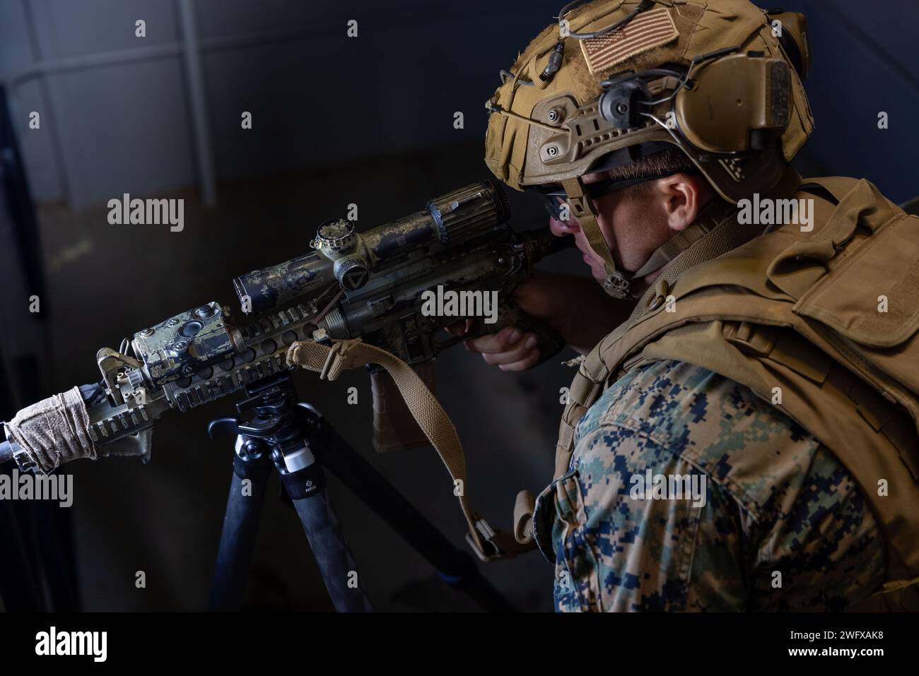 U.S. Marine Corps Lance Cpl. Louis Marsh, a scout sniper with Battalion Landing Team 1/1, 31st ...