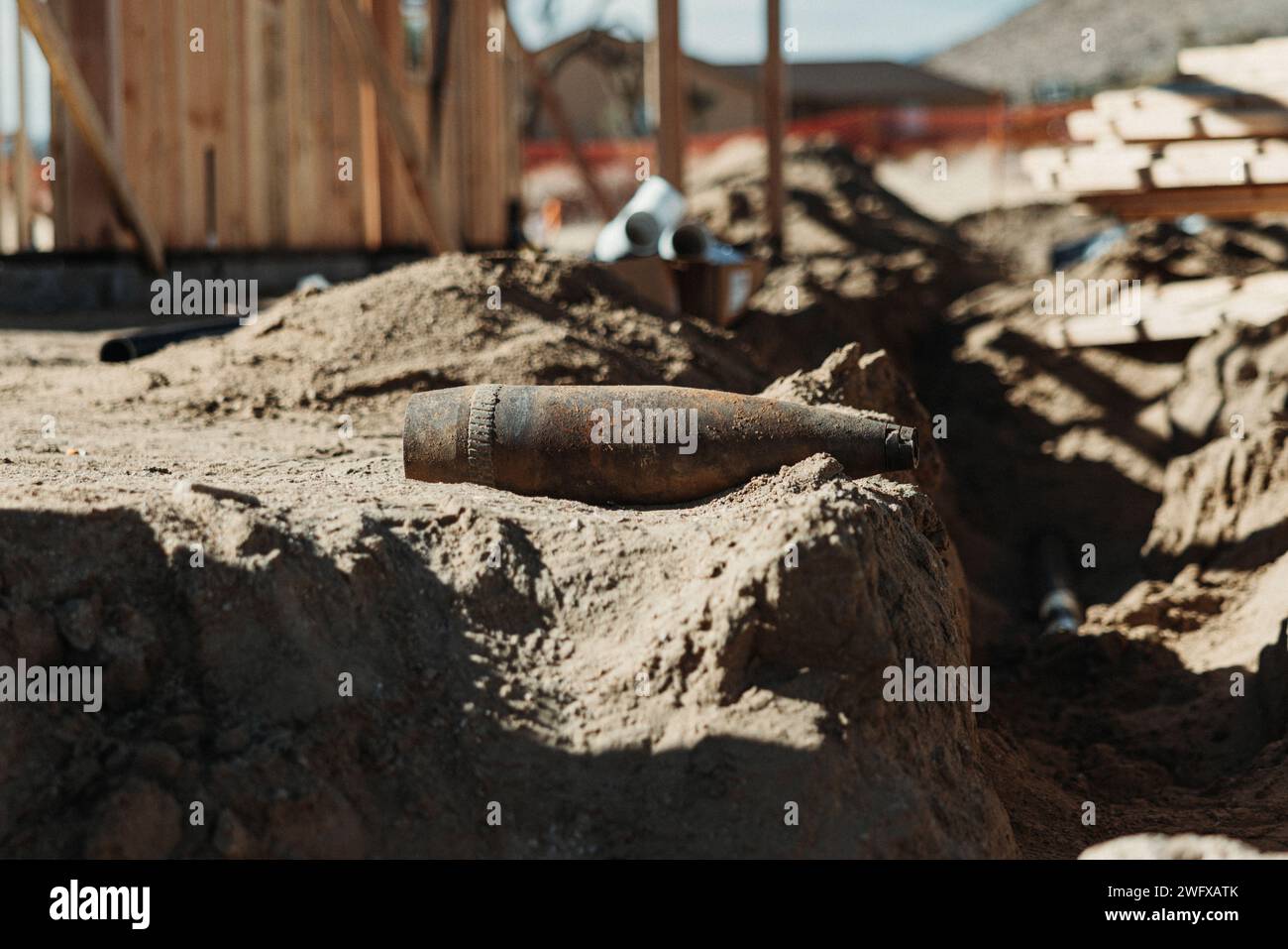 A U.S. Marine Corps 155 mm high-explosive artillery round sits at a ...