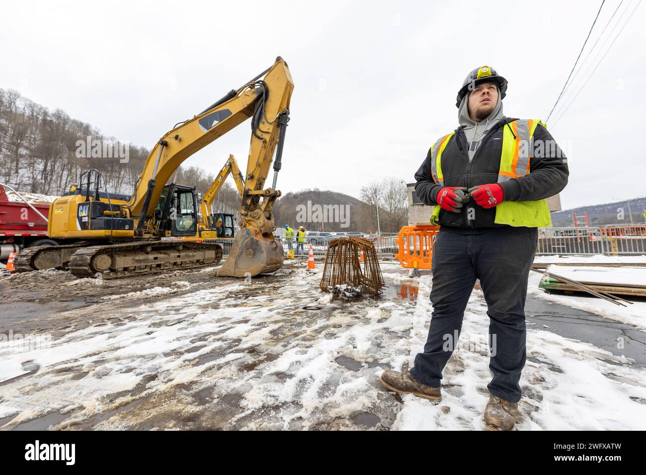 A construction crew working for the U.S. Army Corps of Engineers ...