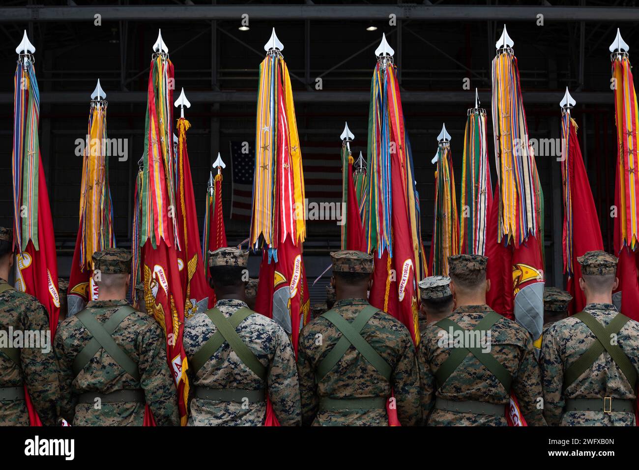 U.S. Marines with III Marine Expeditionary Force hold colors during the ...