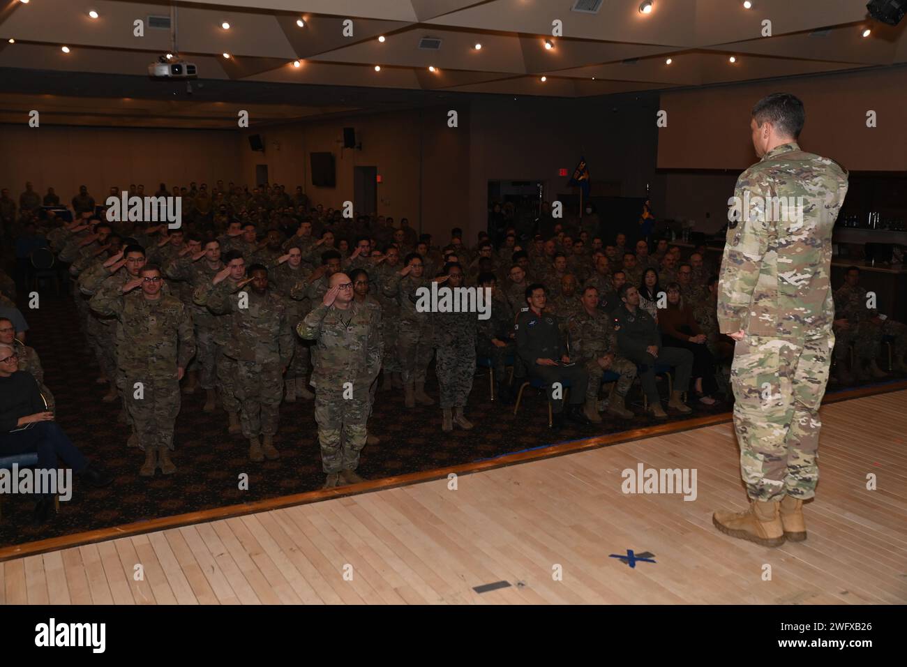 Members of the 607th Air Operations Center render a first salute to Col ...