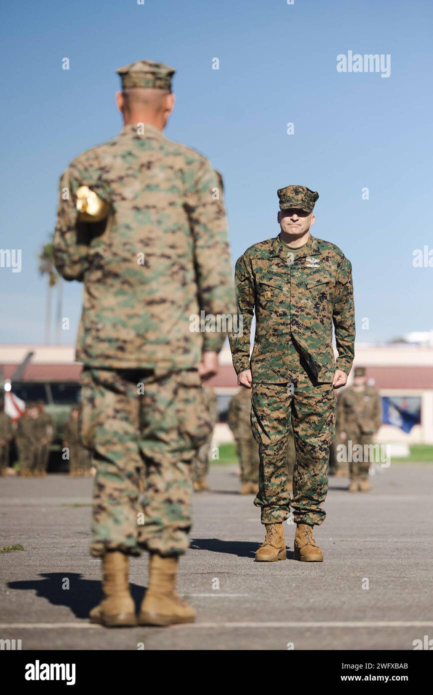 U.S. Navy Master Chief Loren D. Rucker, right, oncoming command master ...