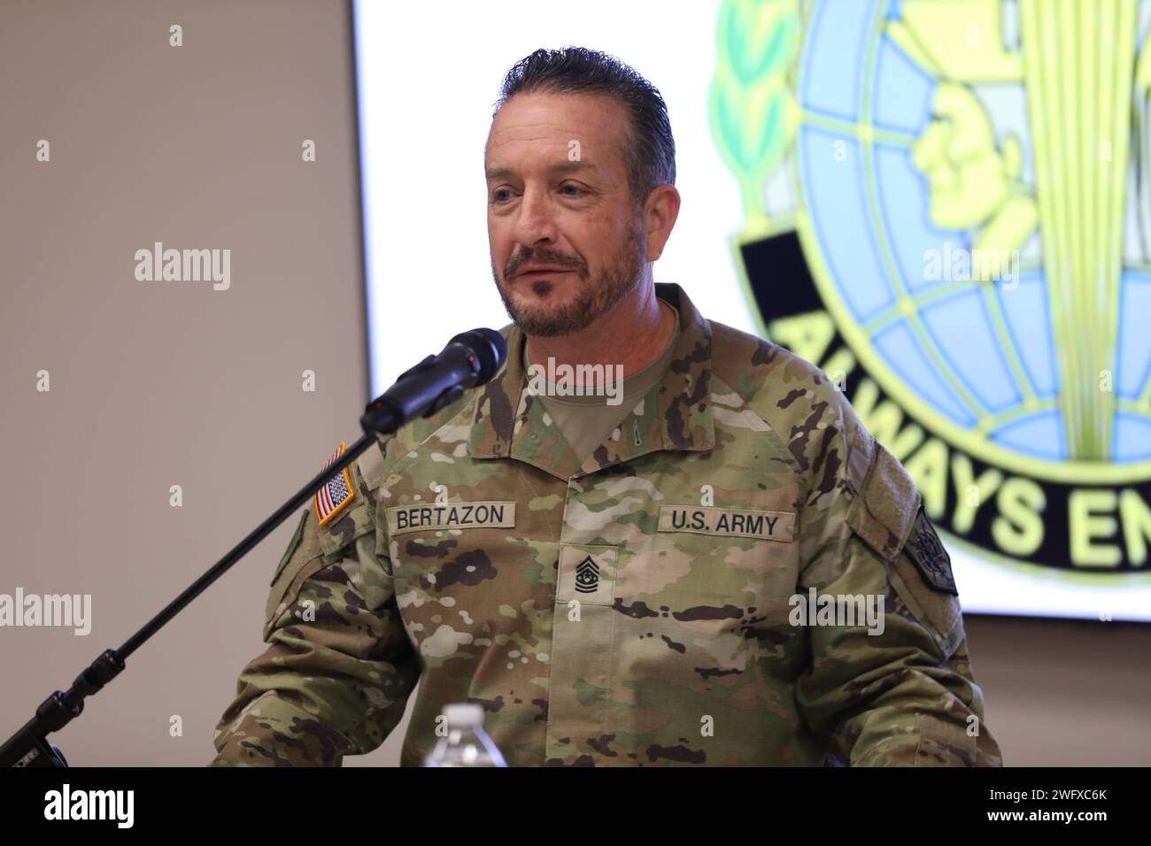 Command Sgt. Maj. (Ret.) Brian Bertazon, speaks during a change of ...