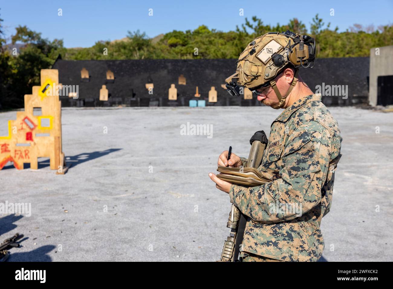 U.S. Marine Corps Cpl. Isaac Walker, a scout sniper with Battalion Landing Team 1/1, 31st Marine ...
