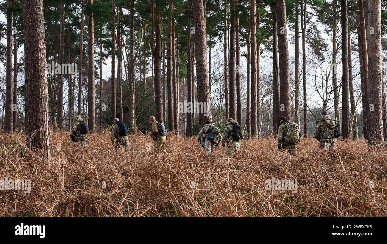 U.S. Airmen assigned to the 352nd Special Operations Wing navigate ...
