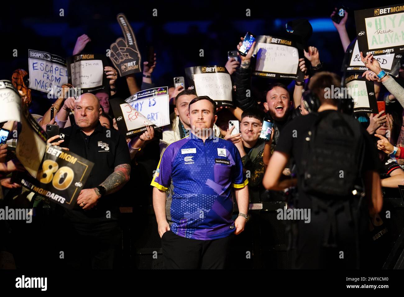 Luke Littler walks out to play Luke Humphries (not pictured) during ...