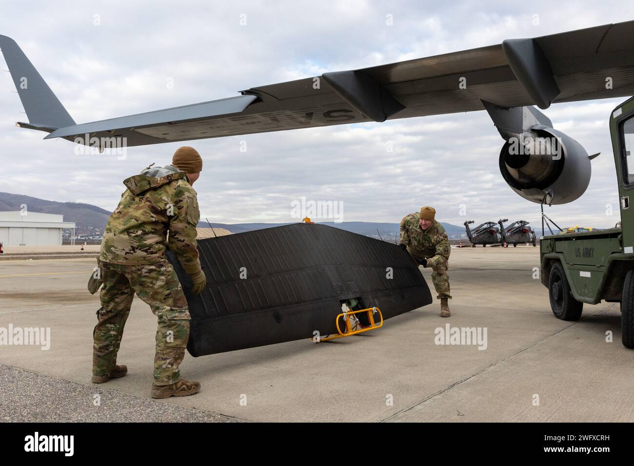 Members of 1st Battalion, 126th Aviation Regiment retrograde nine UH-60 ...