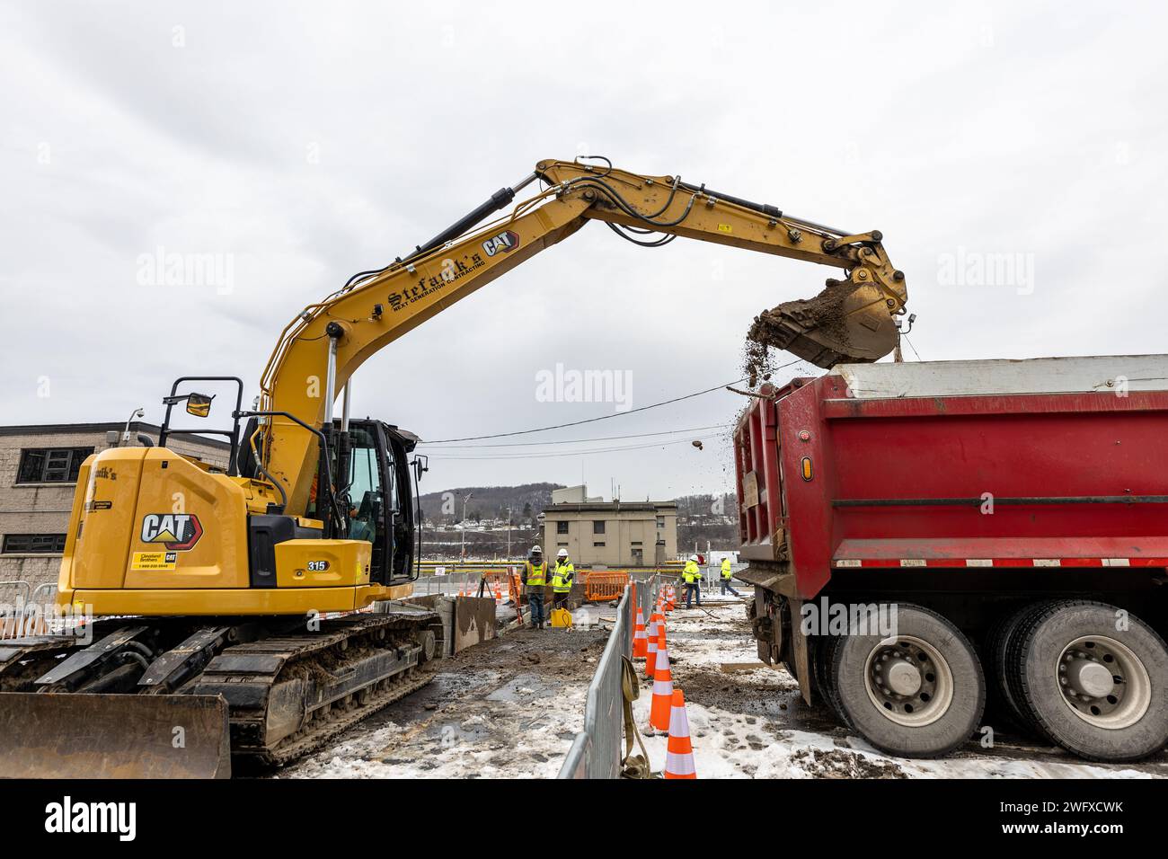 A construction crew working for the U.S. Army Corps of Engineers ...