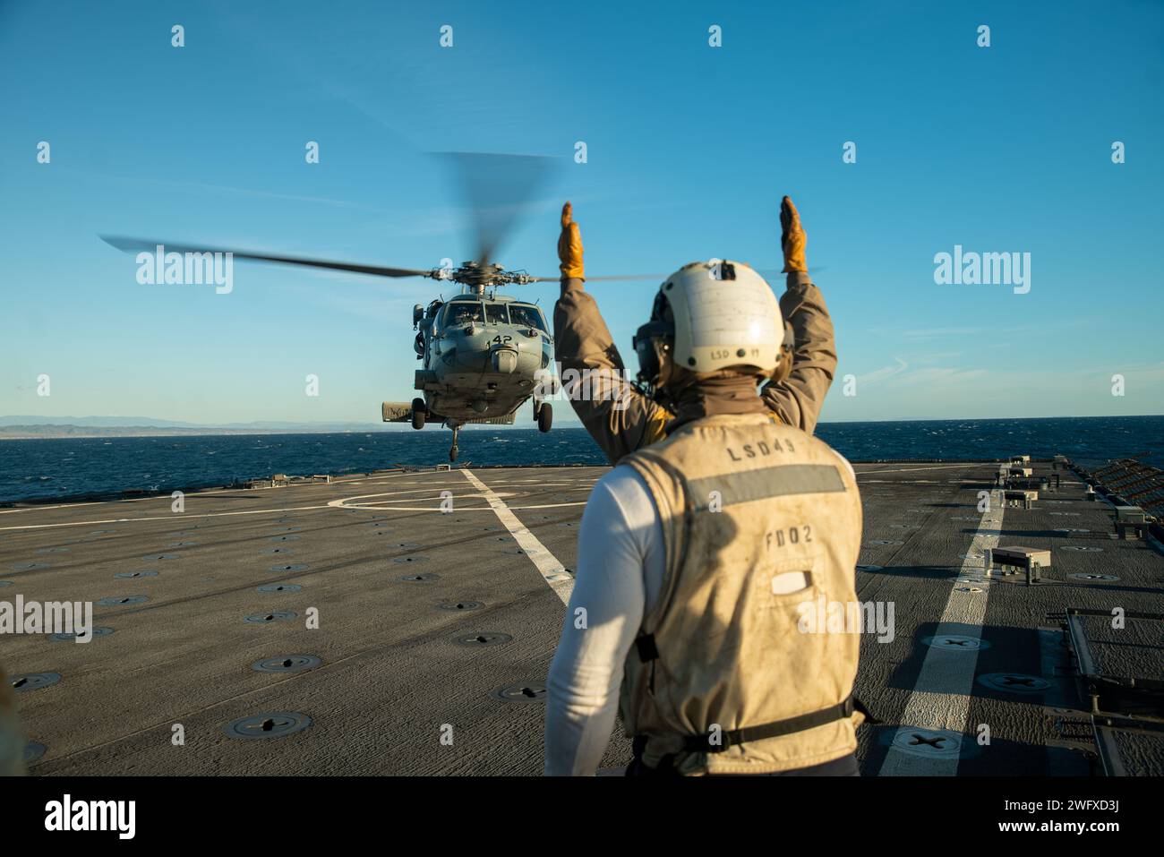 A U.S. Navy MH-60S Sea Hawk attached to Helicopter Sea Combat Squadron ...