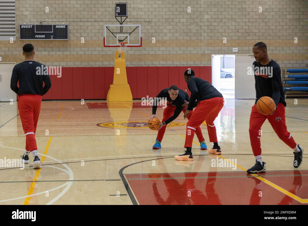 U.S. Marines with the All-Marine Men’s Basketball Team lead a ...
