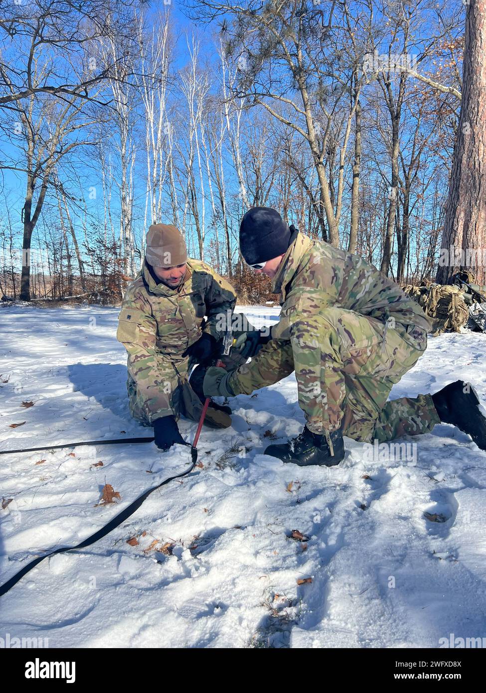Air National Guard Security Forces specialists build an arctic tent ...