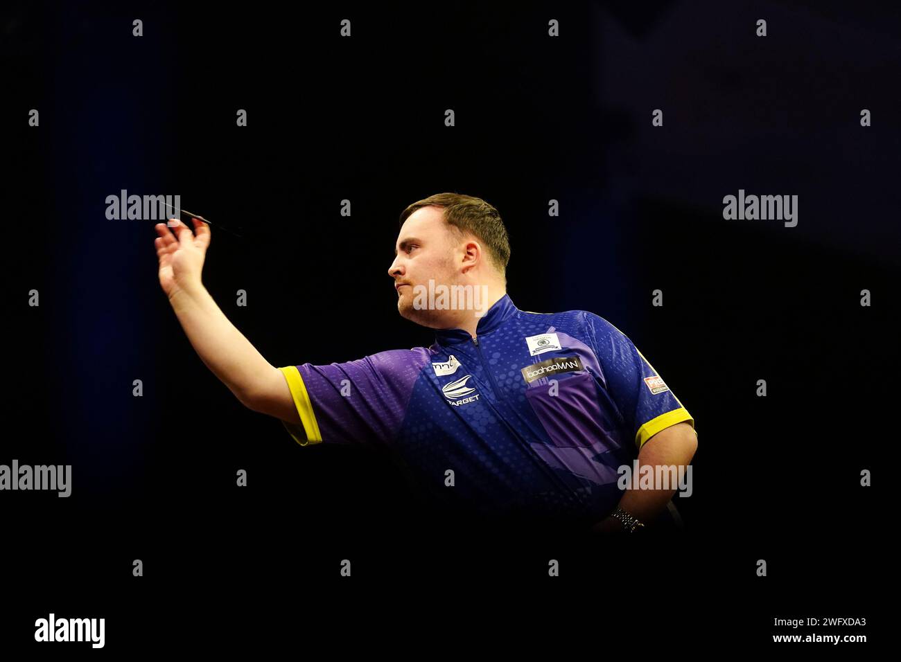 Luke Littler in action against Luke Humphries (not pictured) during ...