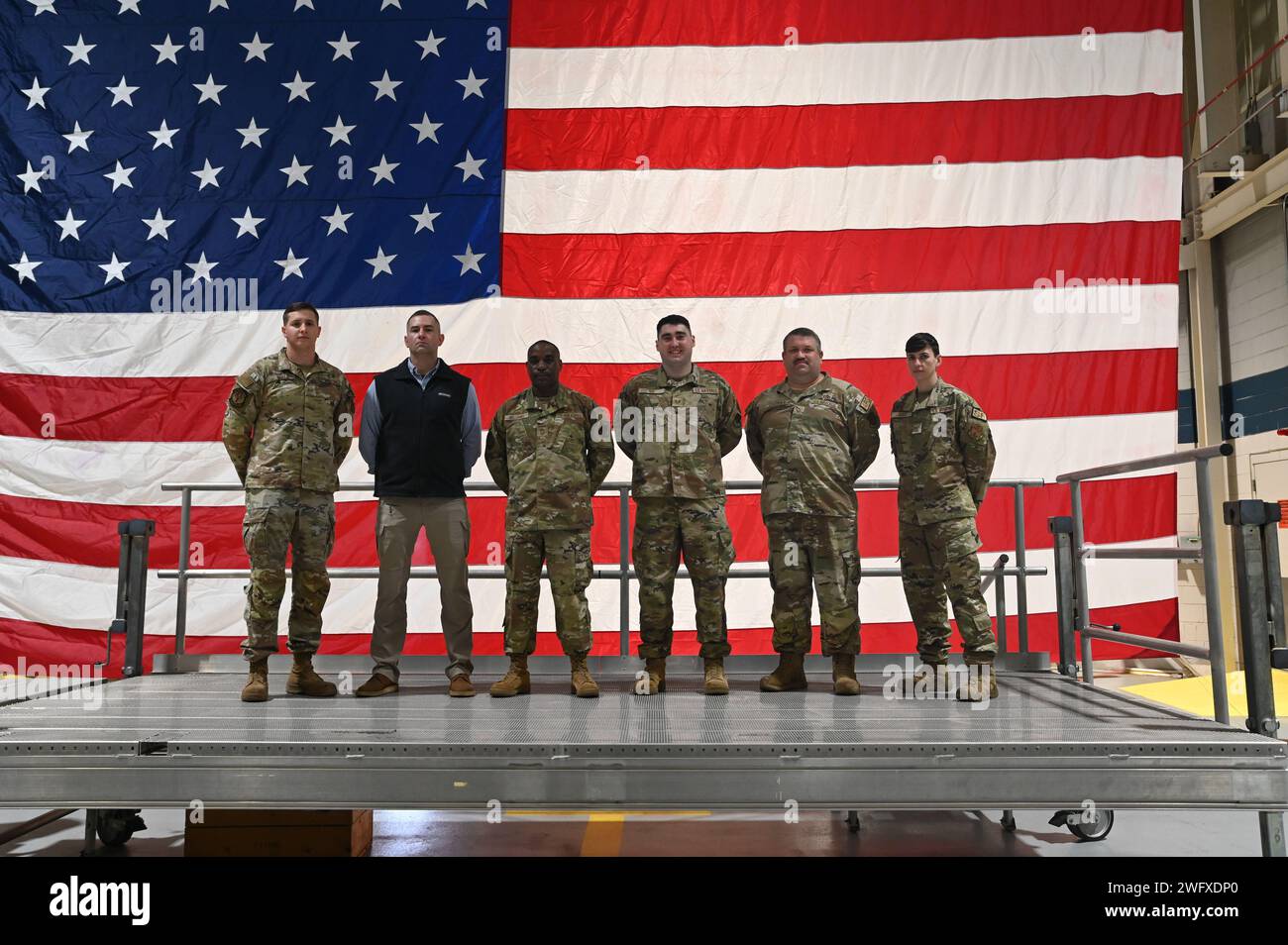 U.S. Air Force Chief Master Sgt. Maurice L. Williams, center, command ...