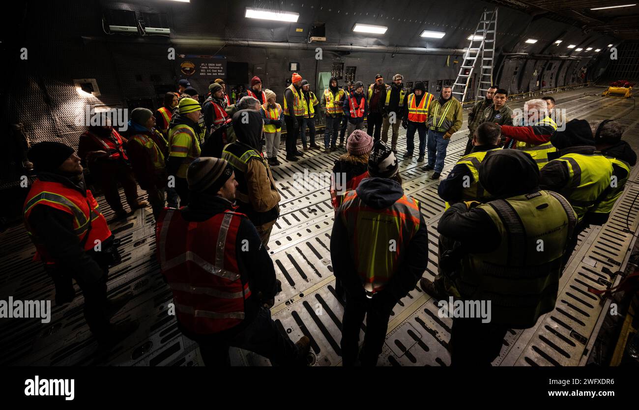 U.S. Airmen assigned to the 9th Airlift Squadron and Lockheed Martin ...