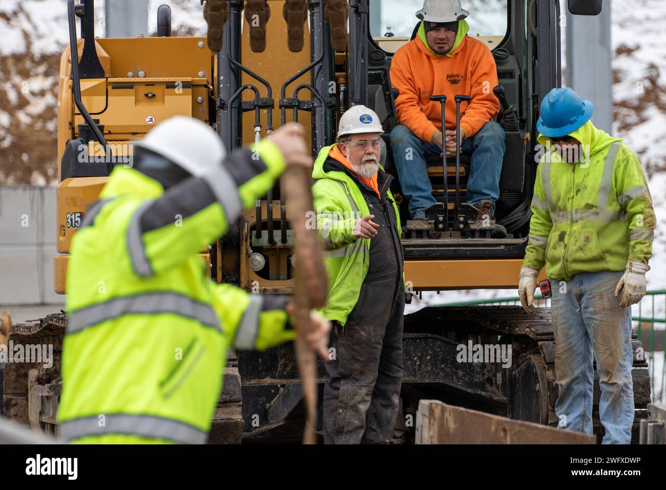 A construction crew working for the U.S. Army Corps of Engineers ...