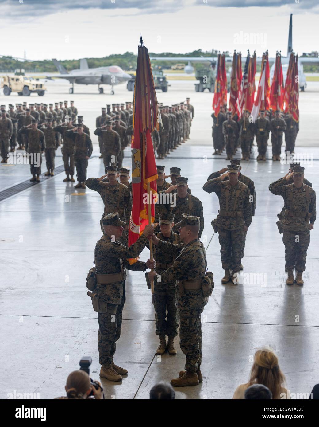 U.S. Marine Corps Lt. Gen. James W. Bierman, right, passes the III ...