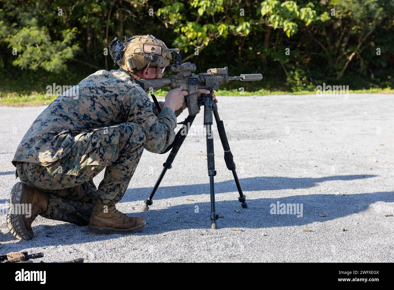 U.S. Marine Corps Cpl. Isaac Walker, a scout sniper with Battalion Landing Team 1/1, 31st Marine ...