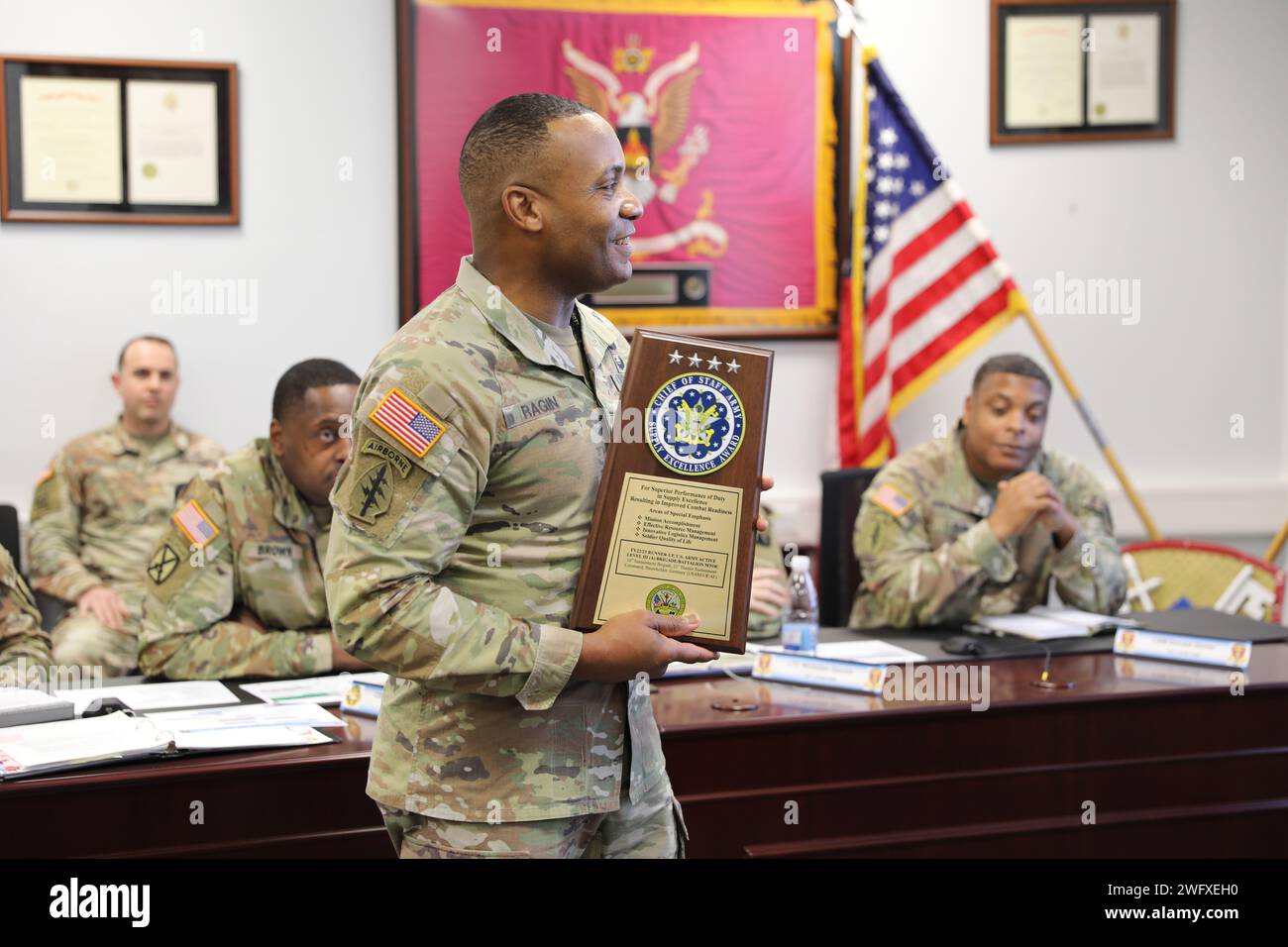 U.S. Army Maj. Gen. Ronald Ragin, commanding general, 21st Theater Sustainment Command, presents ...