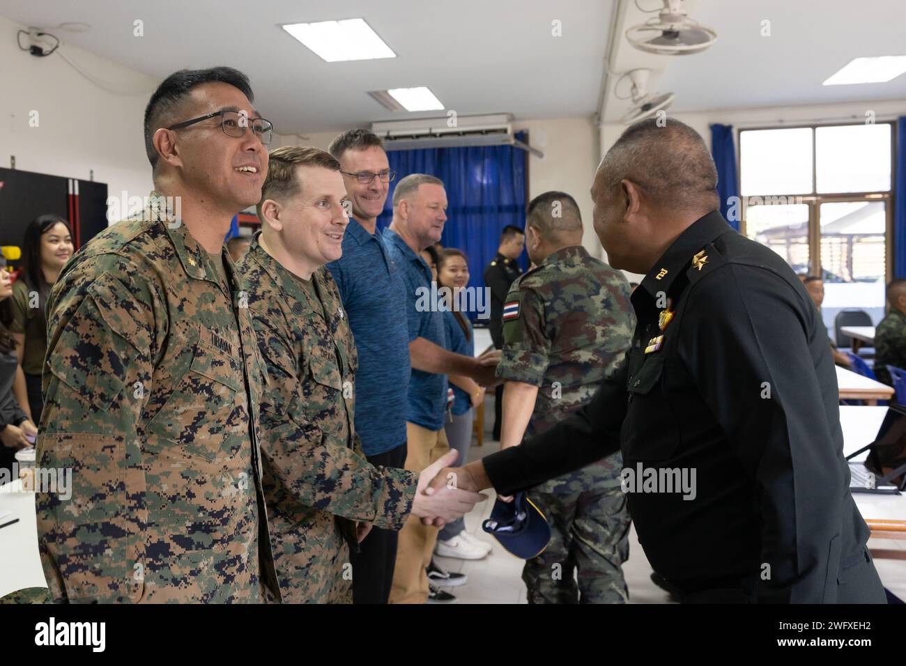 U.S. Marine Corps Maj. Isaac Tibayan, left, the Humanitarian Mine ...
