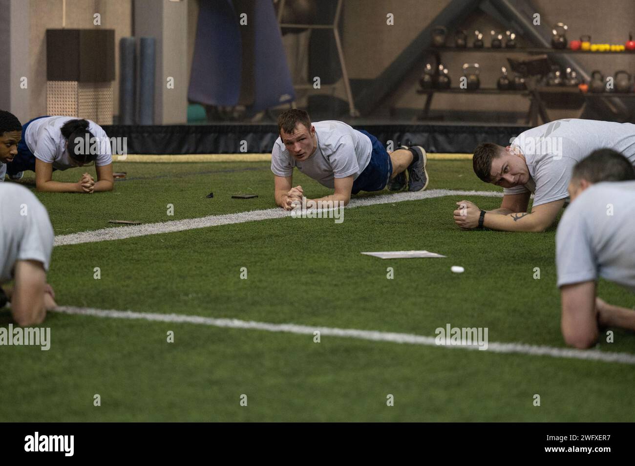Airmen assigned to the 354th Force Support Squadron perform a physical ...