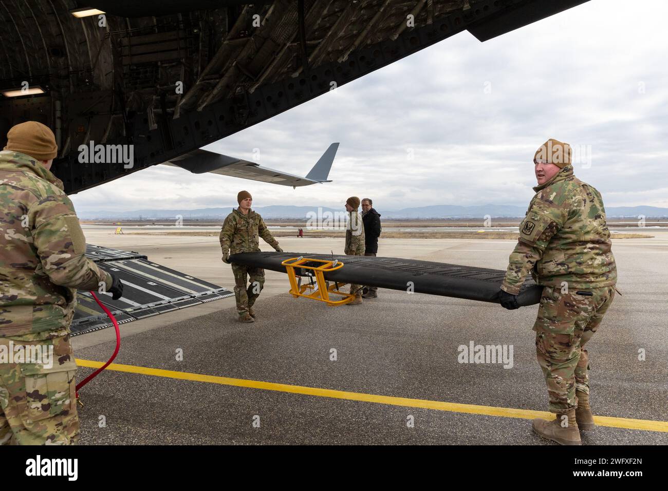 Members of 1st Battalion, 126th Aviation Regiment retrograde nine UH-60 ...