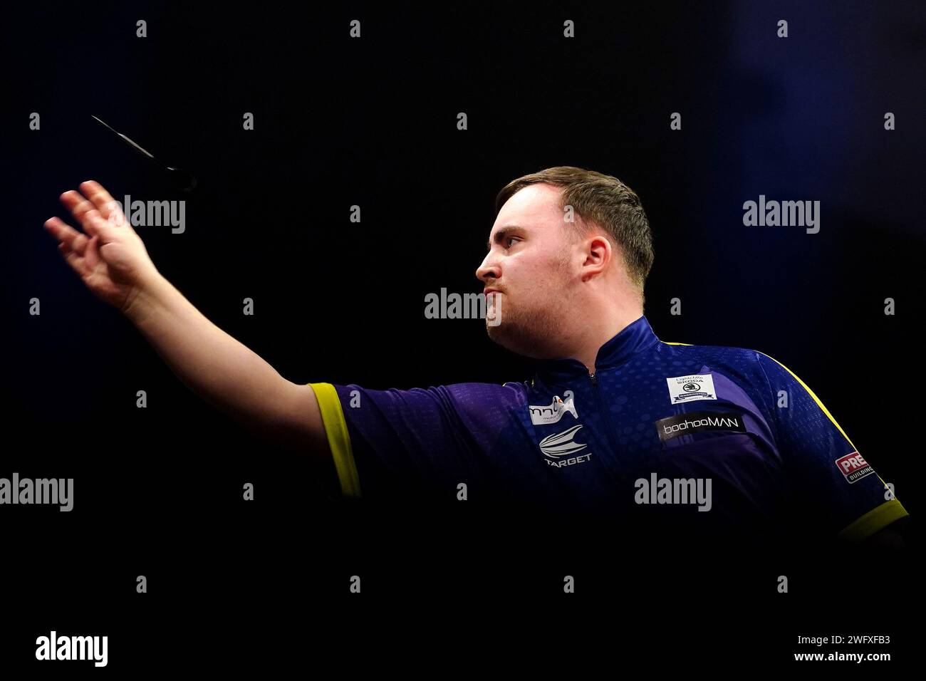 Luke Littler in action against Luke Humphries (not pictured) during ...