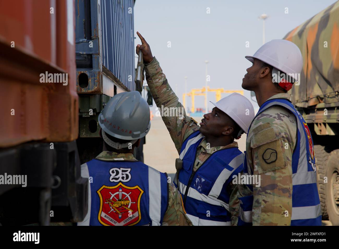 Soldiers assigned to the 665th Movement Control Team, 25th ...