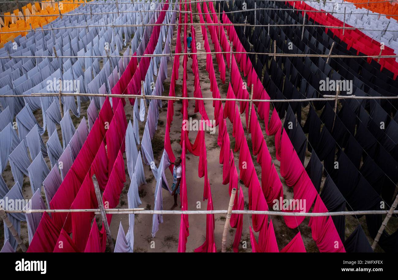 Aerial view of people working in a public laundry hanging for drying ...