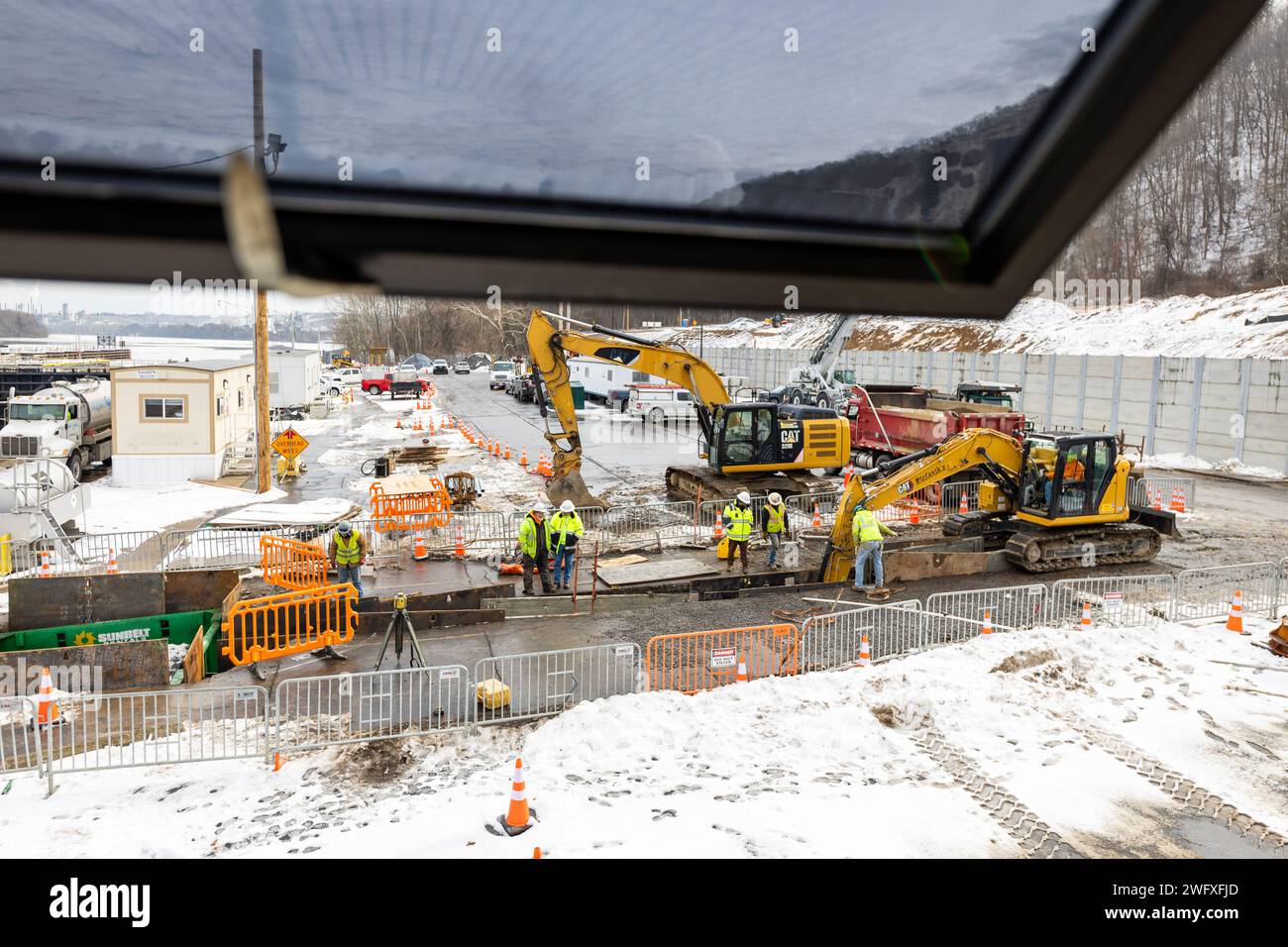 A construction crew working for the U.S. Army Corps of Engineers ...