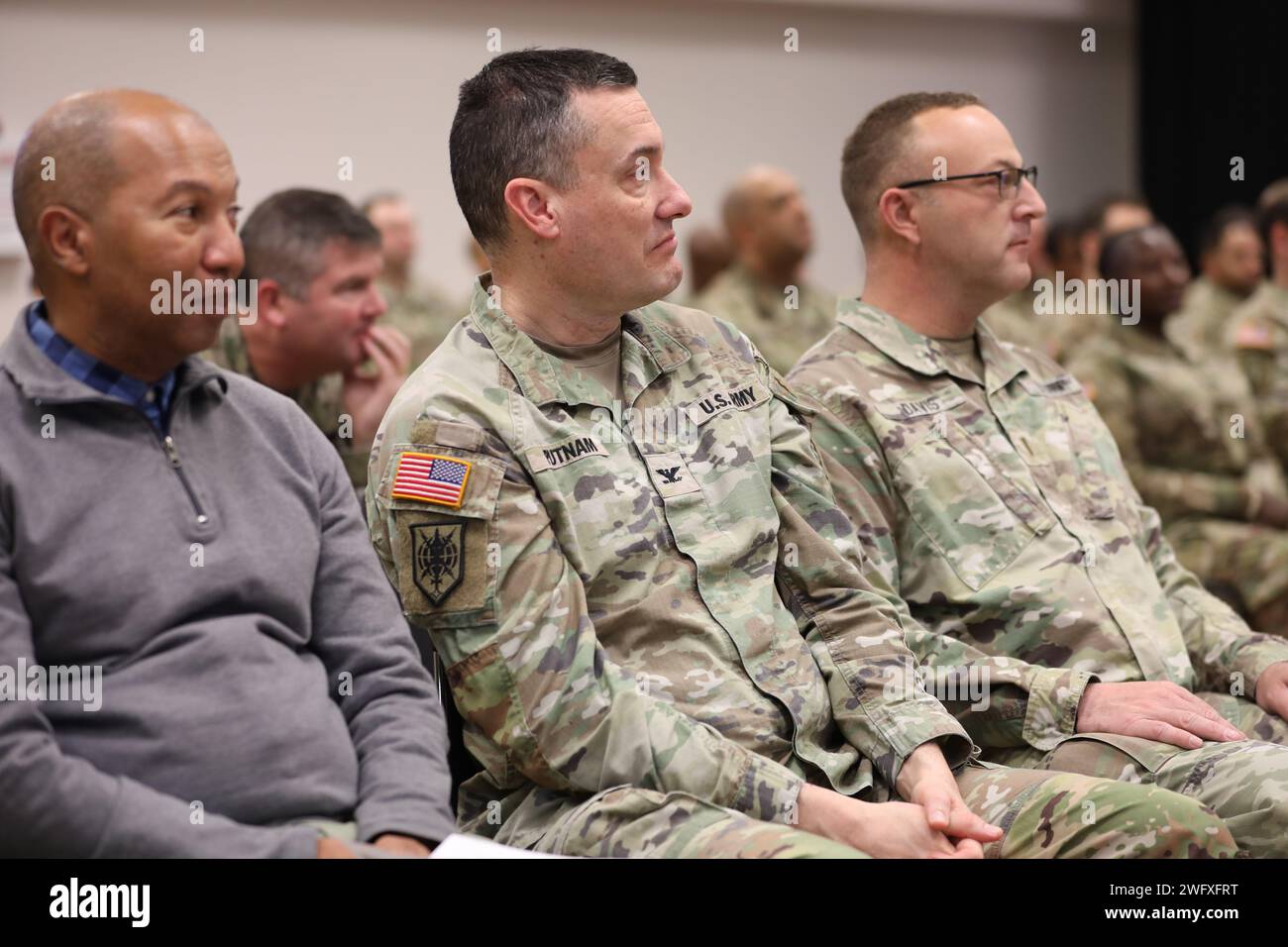 U.S. Army Reserve Col. William Putnam, center, MIRC deputy commander ...