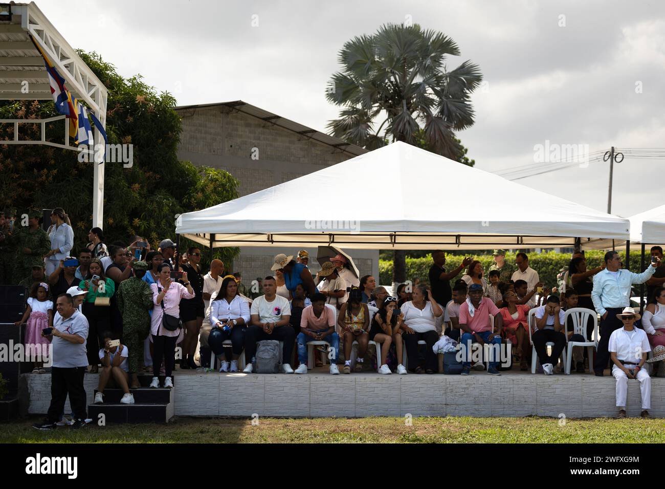 Family members and friends watch as members of the Infantería de Marina ...