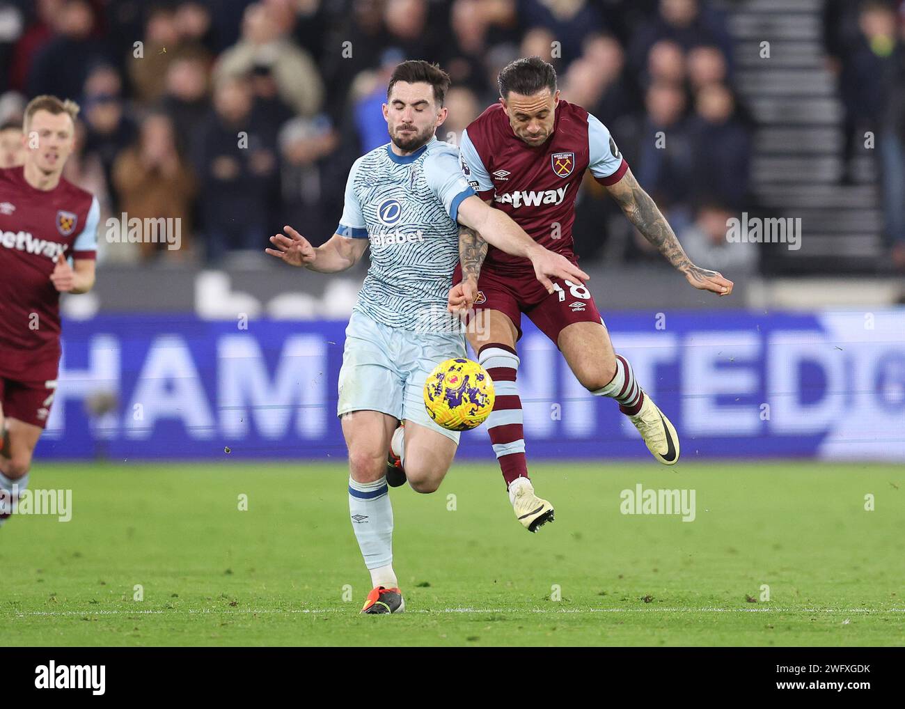 London, UK. 1st Feb, 2024. Lewis Cook of Bournemouth and Danny Ings of ...