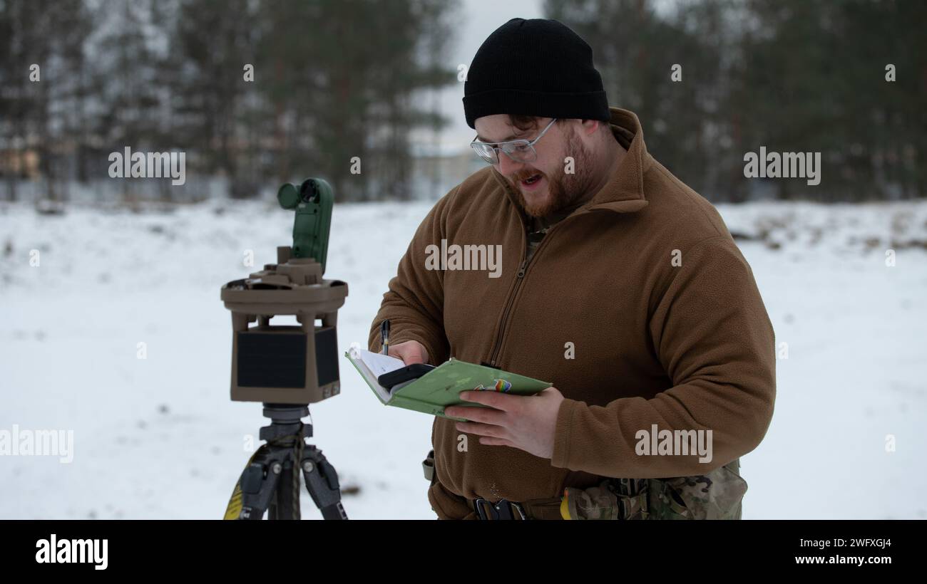 U.S. Air Force Staff Sgt. Moshe Lee conducts weather surveillance ...
