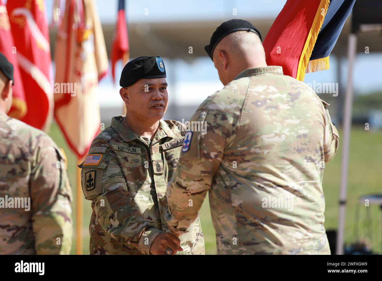 U.S. Army Command Sgt. Maj. Shon K. Antolin, left, outgoing command sergeant major of the 29th ...