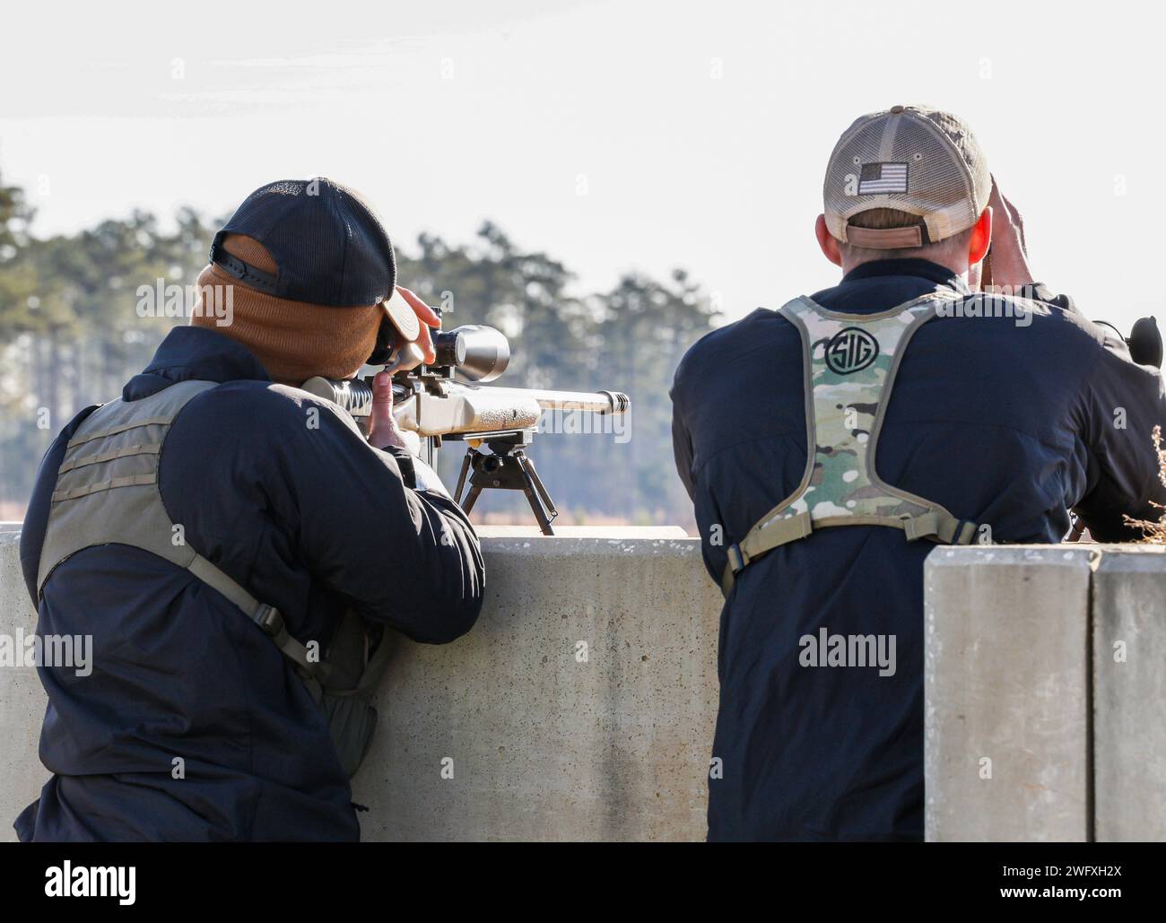 Spc. Dustin Carr and Staff Sgt. Jacob Blackburn, both shooter and ...