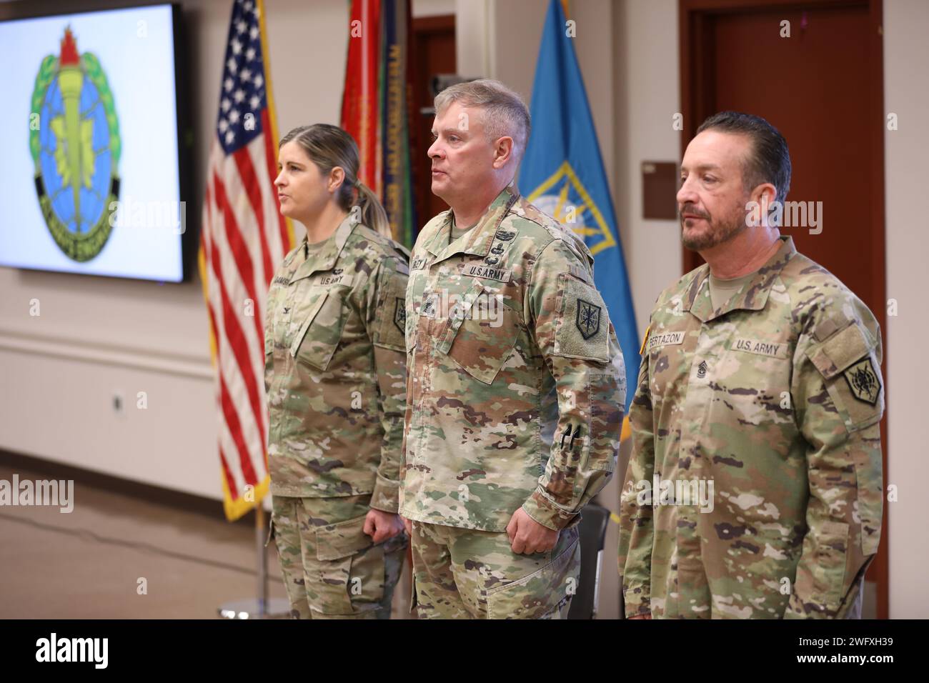 U.S. Army Reserve Col. Melissa Adamski, left, commander of the Military Intelligence Readiness ...