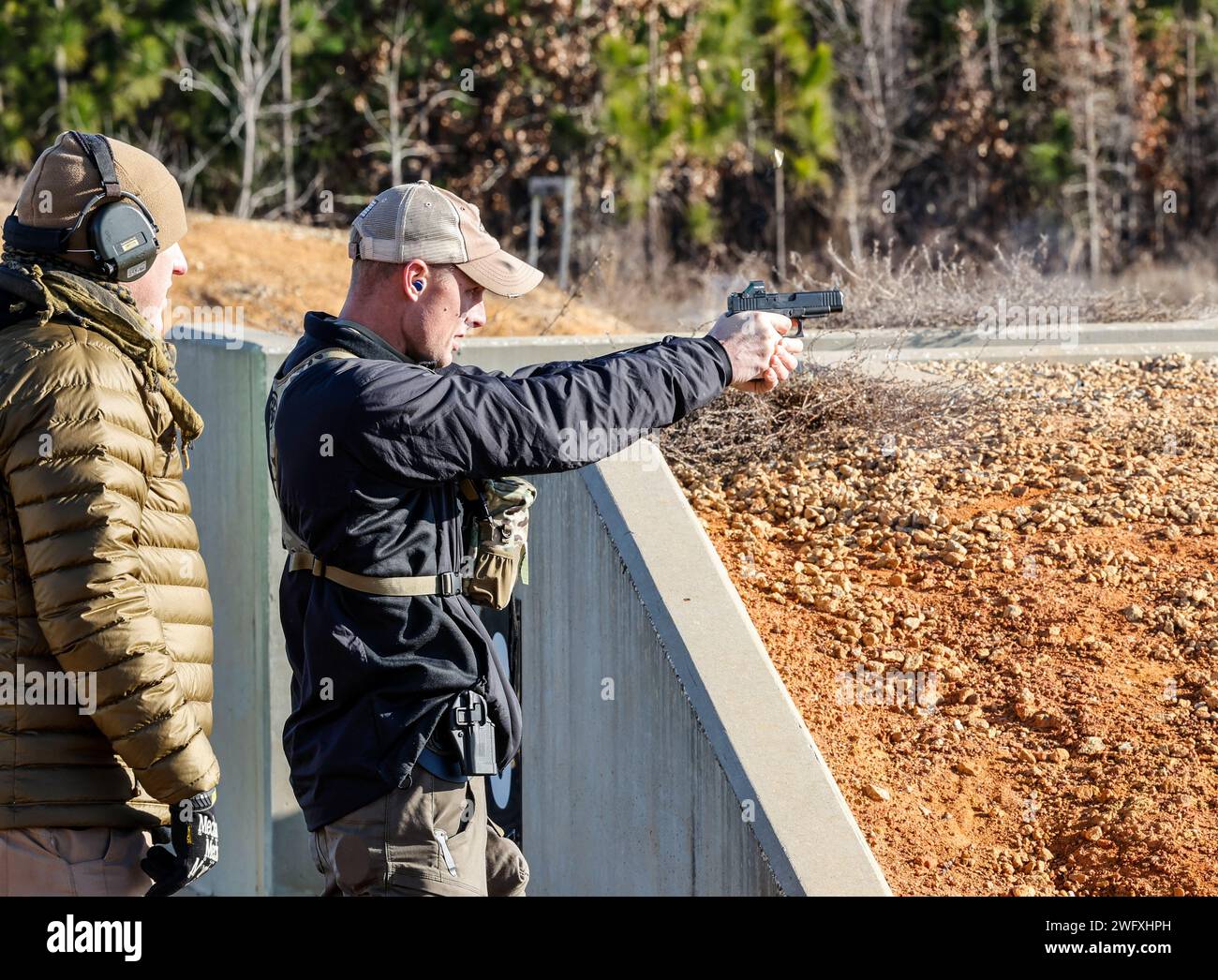 Staff Sgt. Jacob Blackburn, a shooter and instructor assigned to the U ...