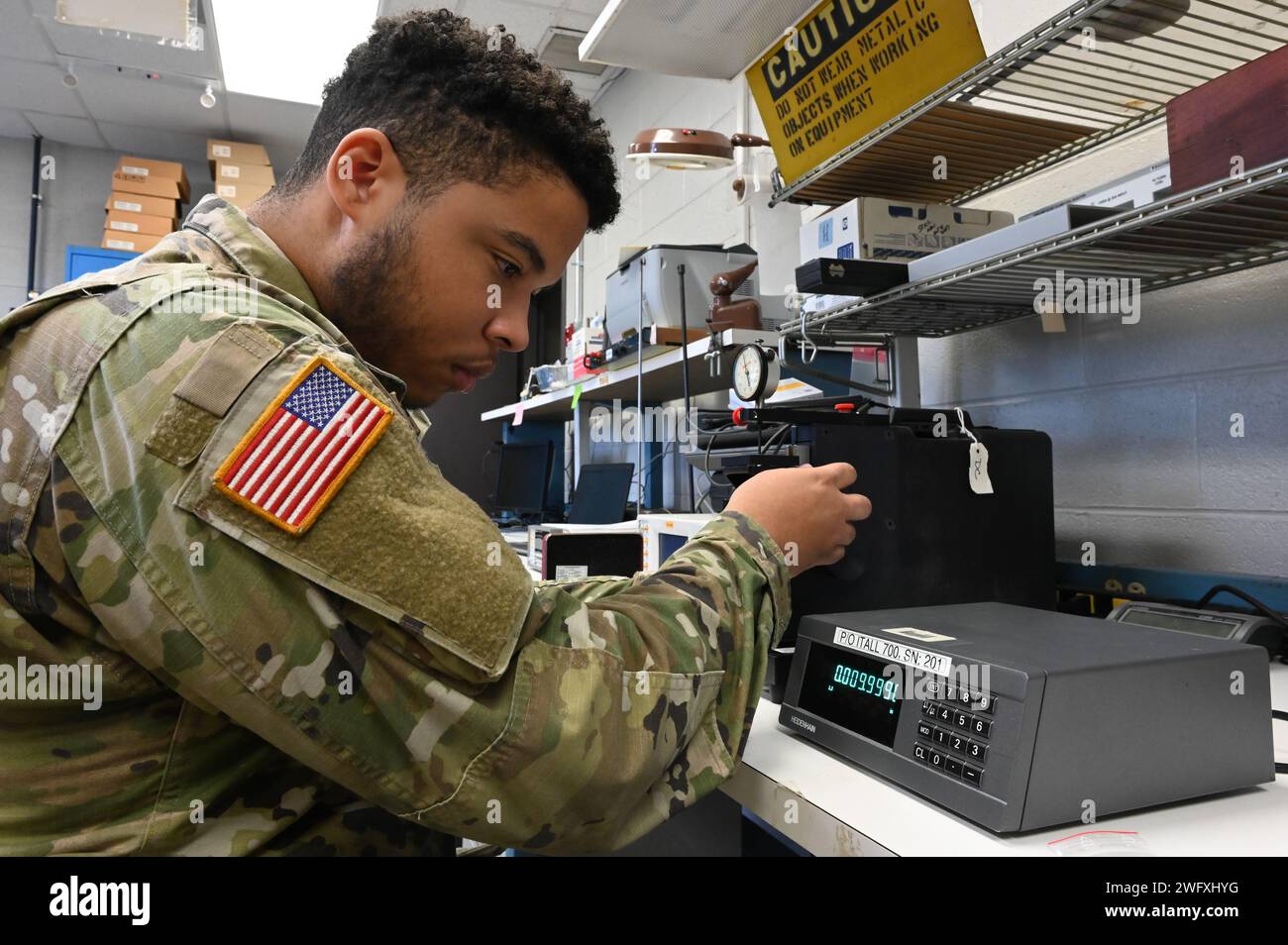 Spc. John Parker, a District of Columbia National Guard electronics and ...
