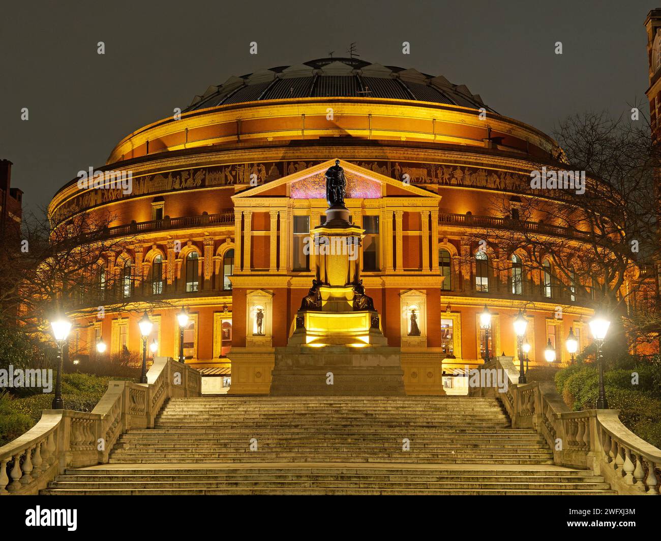 View of the Royal Albert Hall illuminated in at night early evening ...