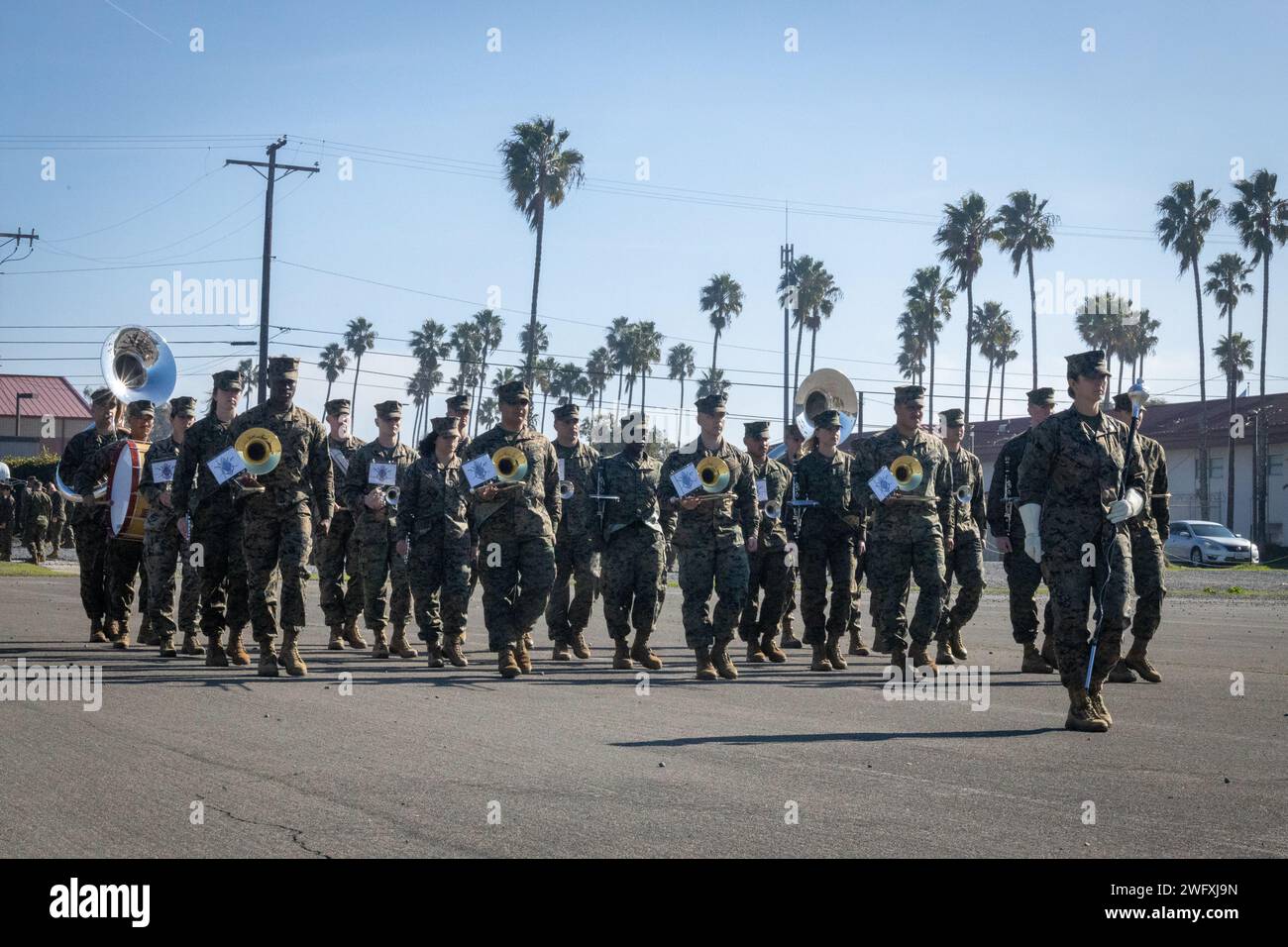 U.S. Marines, with 1st Marine Division Band, march during a change of ...
