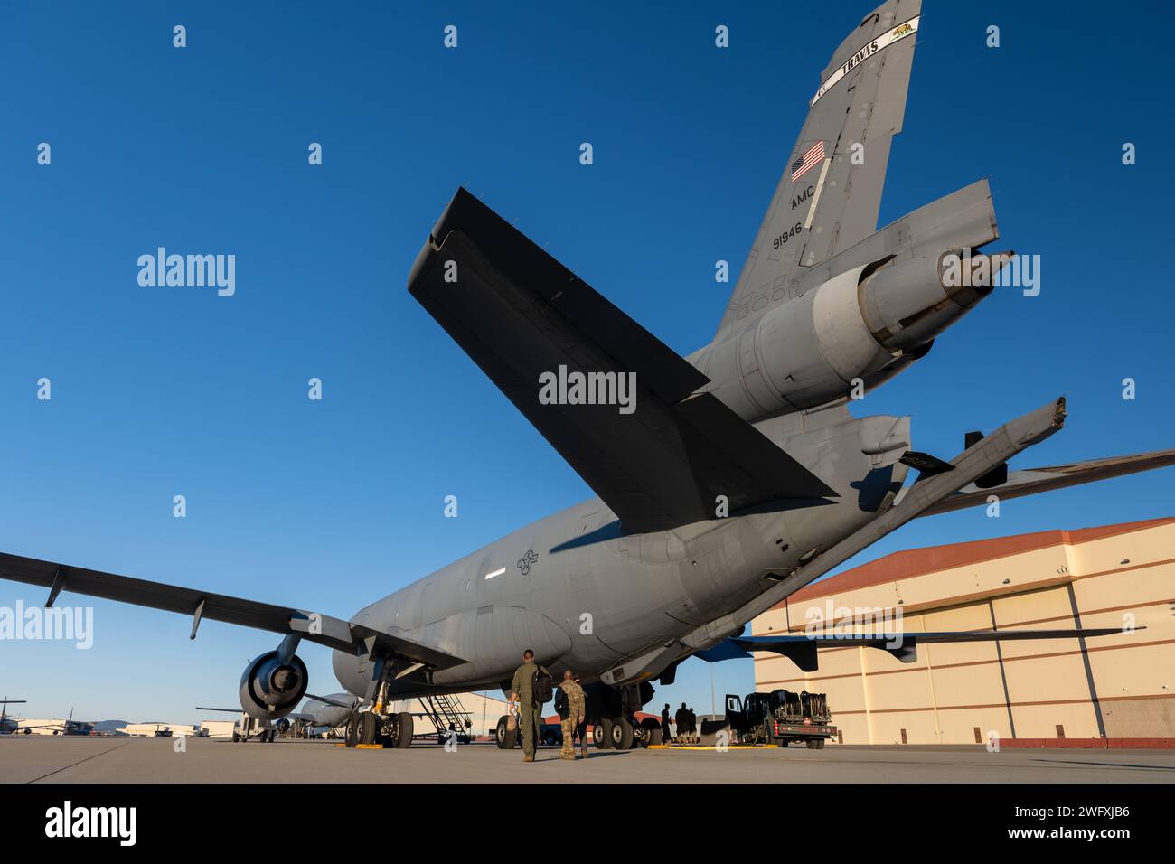 U.S. Airmen from the 9th Air Refueling Squadron inspect a KC-10 ...